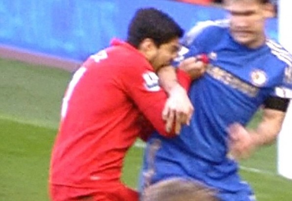 THE CANNIBAL AT LIVERPOOL: Luis Suarez Took Another Bite For A Ten Game Ban