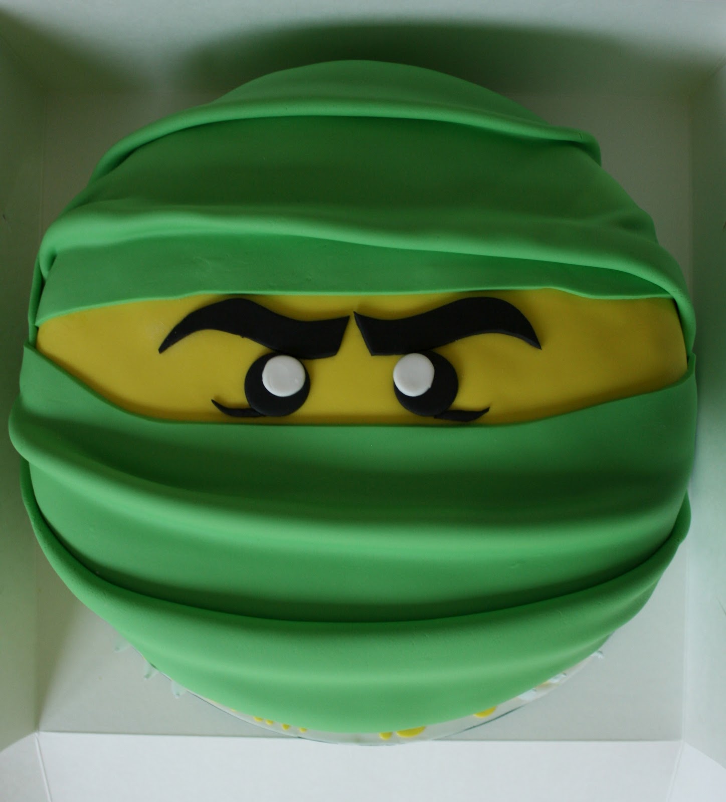 Baked By Design Green Lego Ninja Head Cake baked-by-design-green-lego-ninja-head-cake