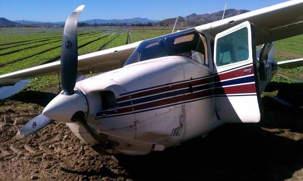 Kathryn's Report: Pilot makes emergency landing in farm field.