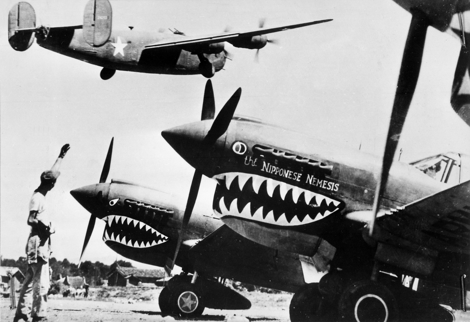 World War II Pictures In Details B 24D Liberator Of 308th Bomb Group Passes P 40Ks Of 23rd world-war-ii-pictures-in-details-b-24d-liberator-of-308th-bomb-group-passes-p-40ks-of-23rd