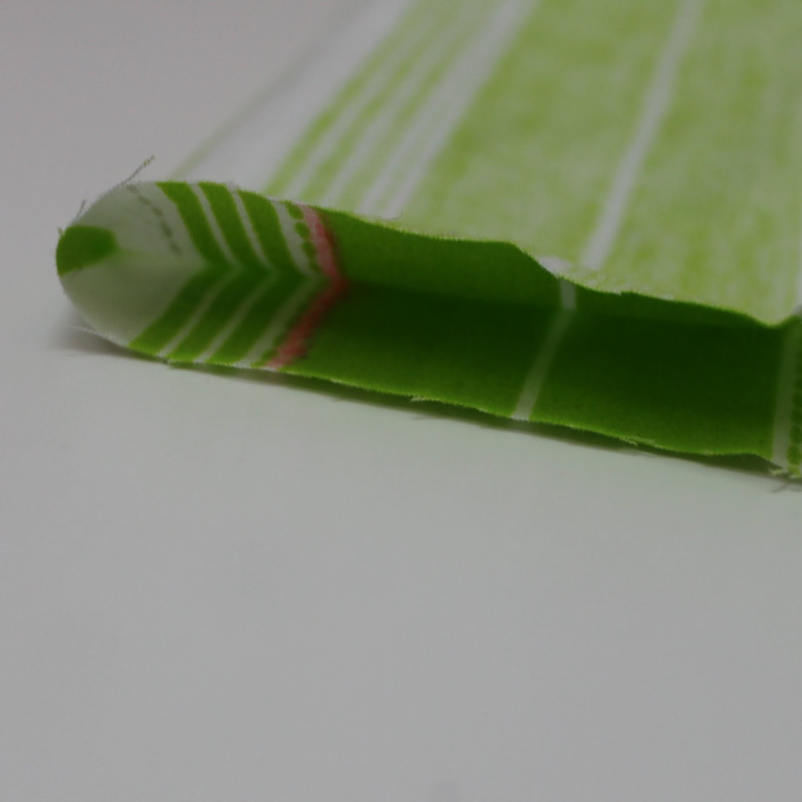 2. Fold fabric such that the marks coincide on the right side.