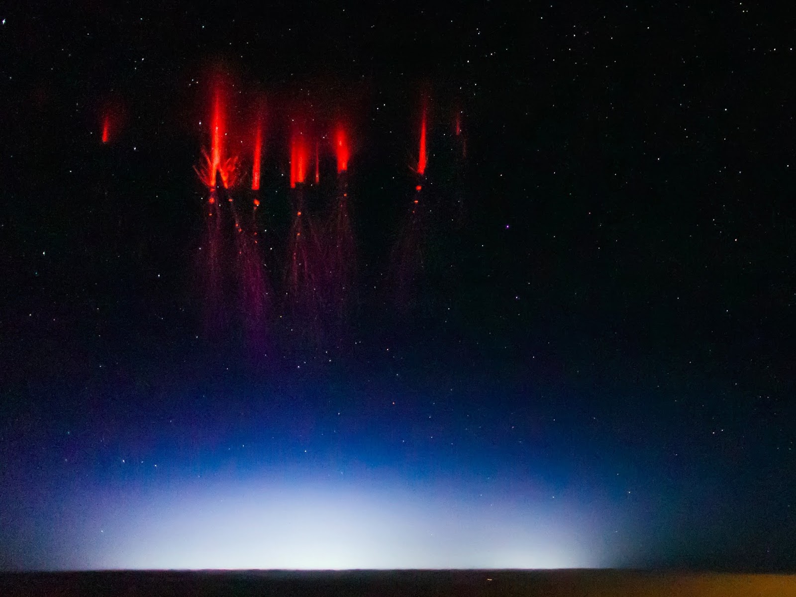 Songs of Eretz Poetry Review: "elusive red sprites" by Lauren McBride