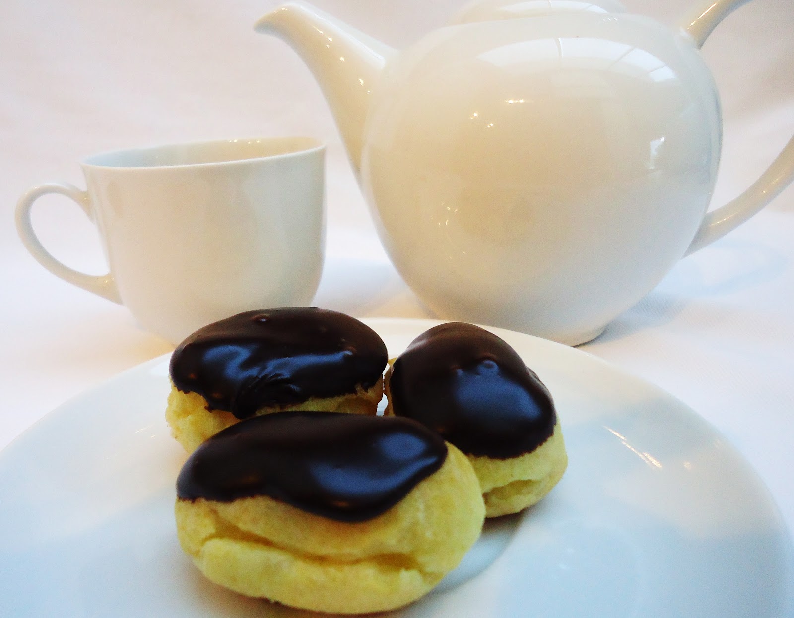 Delish.: Mouth watering mini chocolate eclairs filled with Creme Patisserie