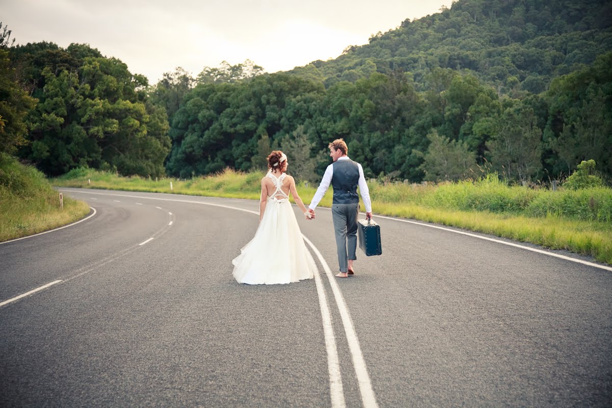 wedding couple walking down road | Wedding couples, Wedding photos ...