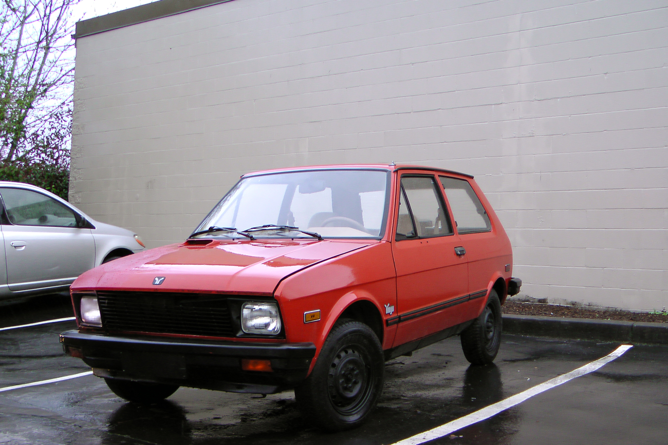 OLD PARKED CARS.: 1986 Yugo GV (Great Value).