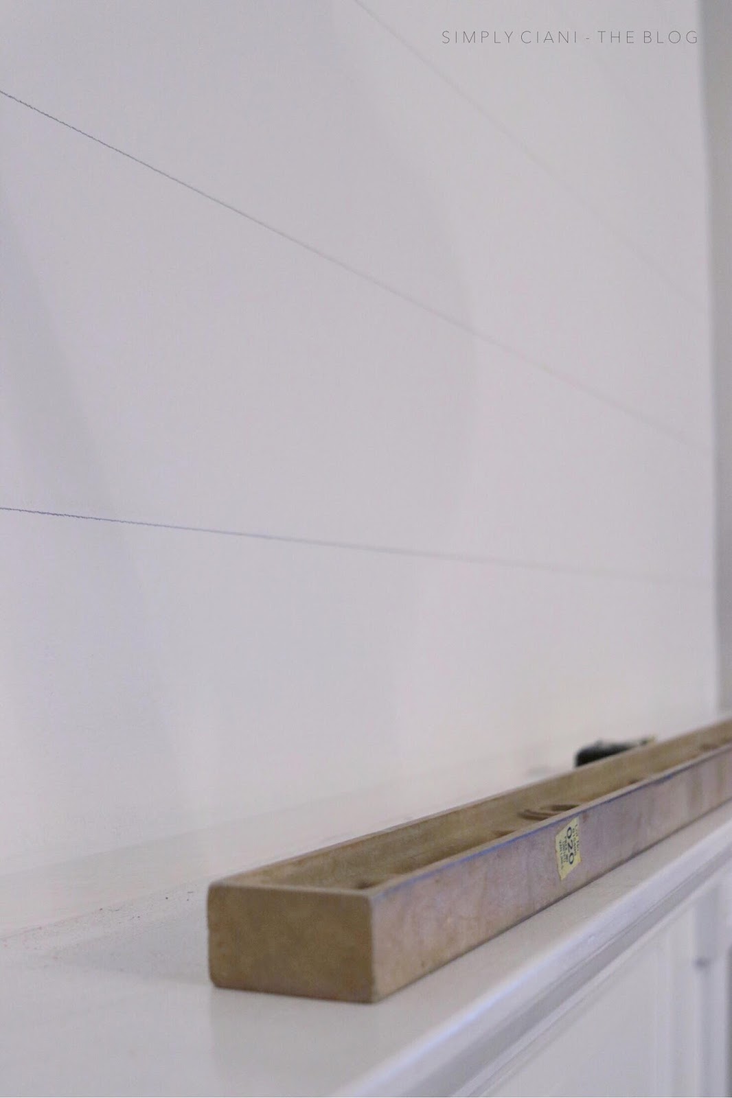 DIY Painted Faux Shiplap Wall Tutorial | Simply Ciani