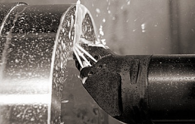 Lathe machine work cutting oils