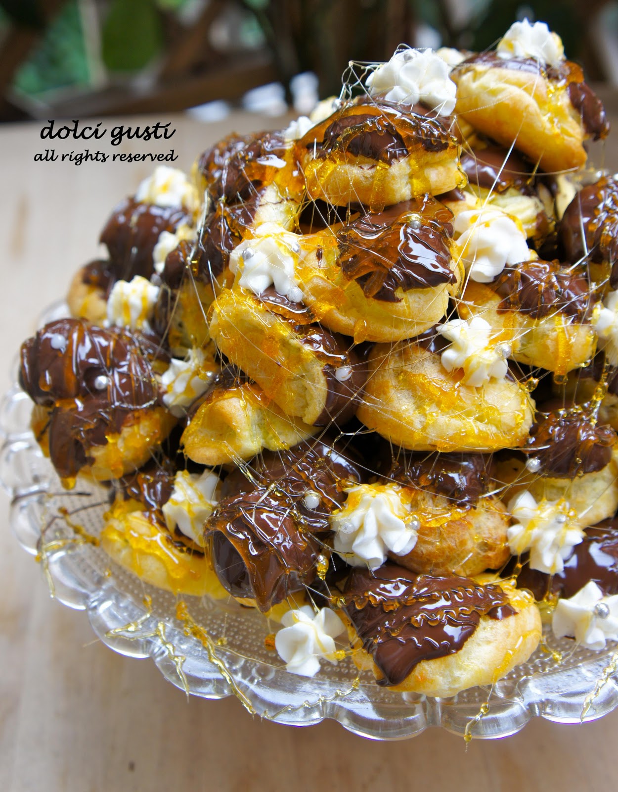 chocolate and cakes: profiteroles with chocolate, butter cream and ...