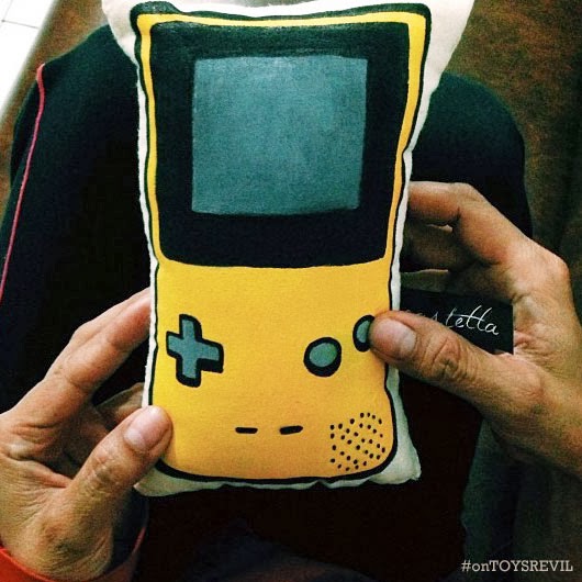 Handheld Game Console Plush-Cushions by Castella Natalia