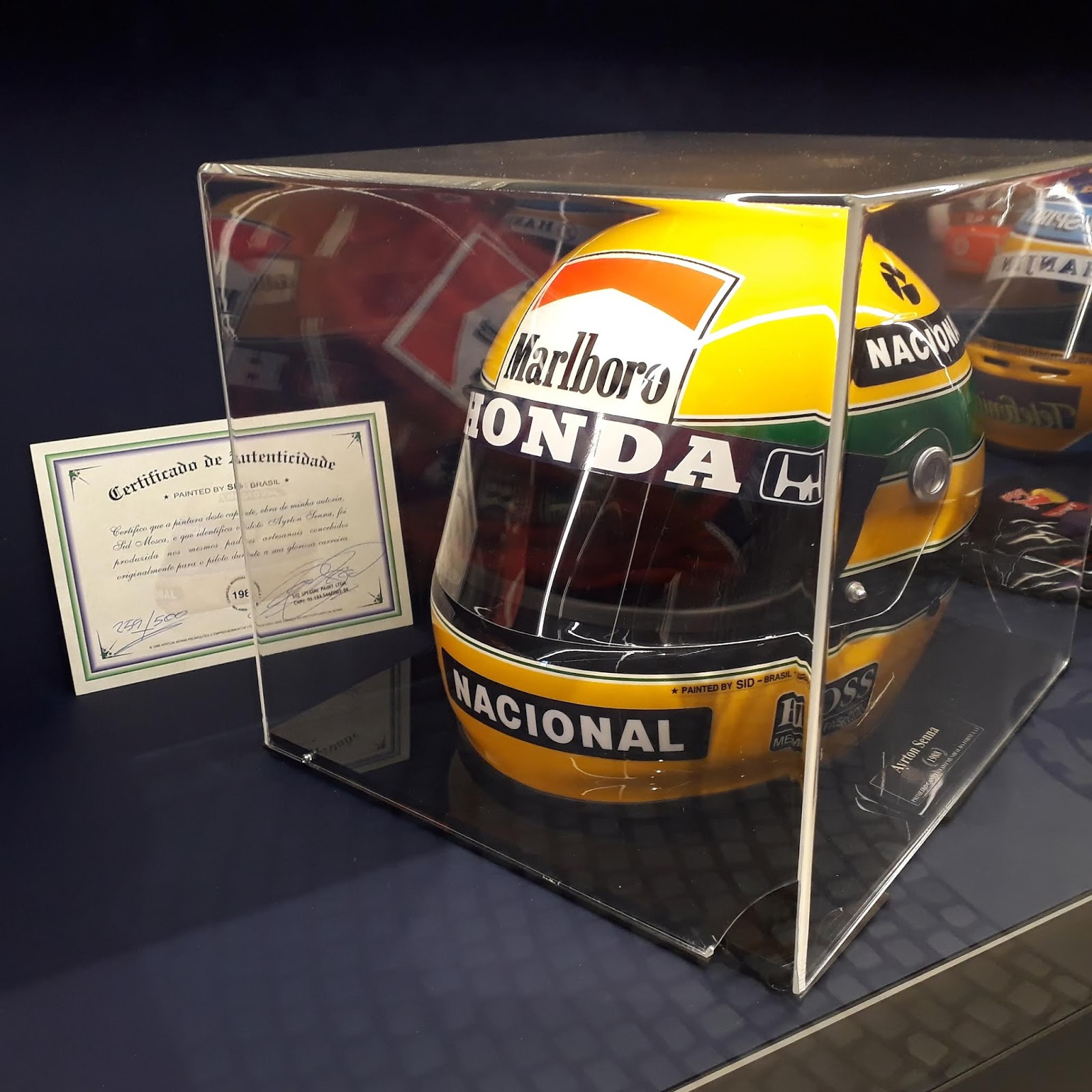 idsGarage: Suit And Helmet Of Ayrton Senna at The FIA Building In Paris