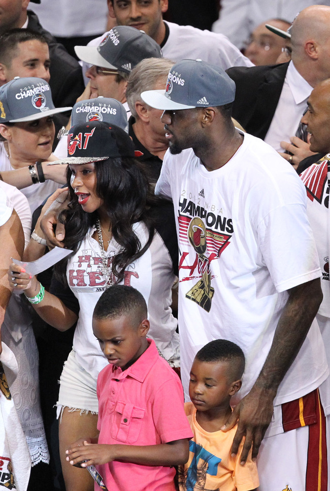 Basket Ball Players In Action: lebron james with his kids
