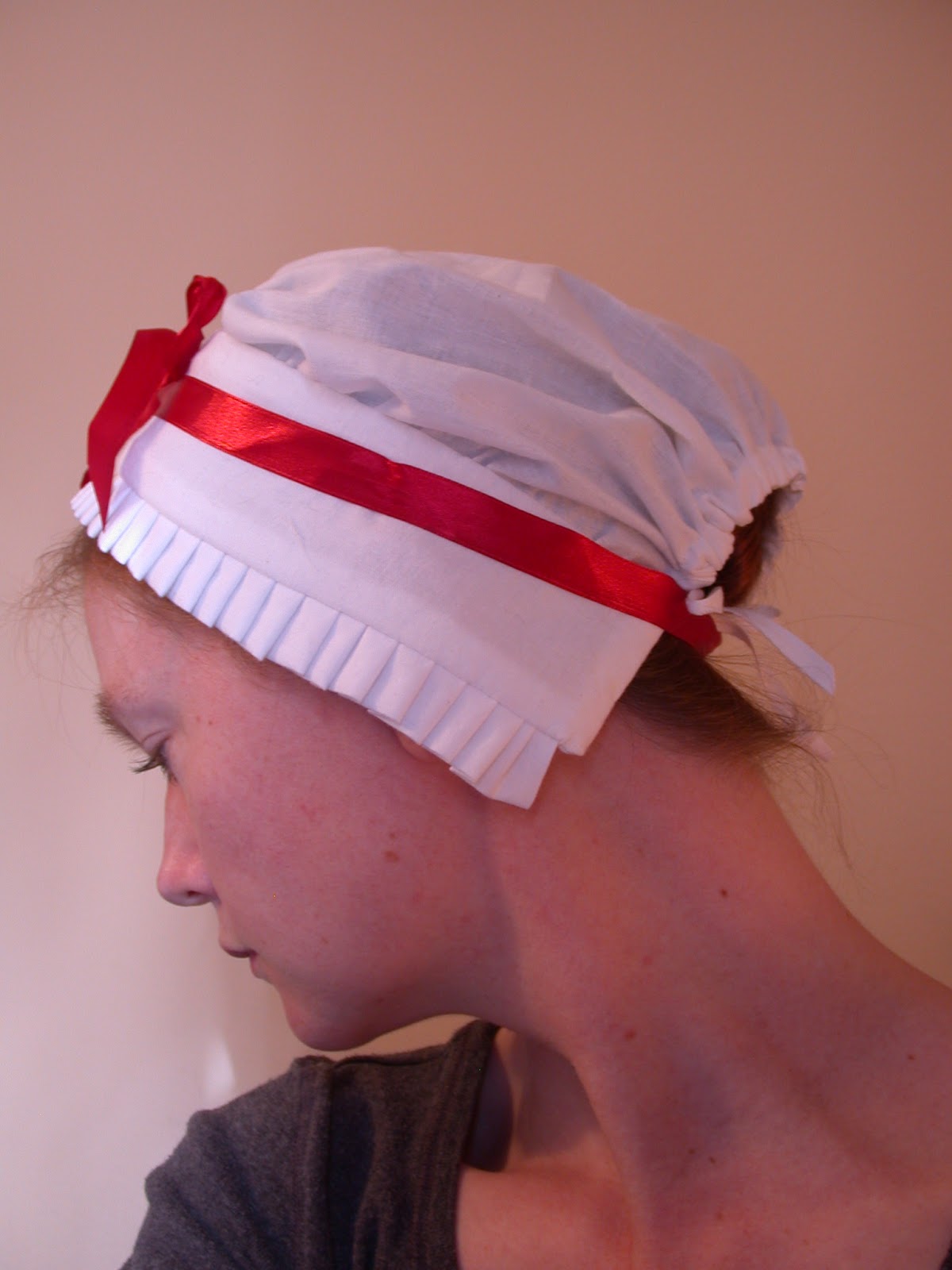 A Sartorial Statement: A Muff And A Mob Cap