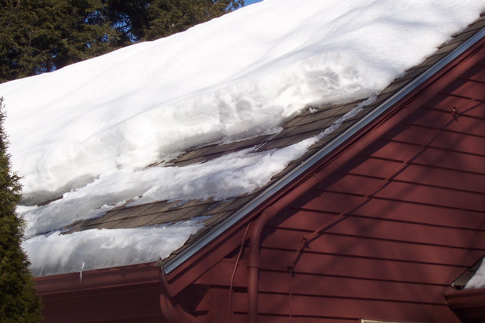 How to Rake SnowOff Your Roof: Photos of an Ice Dam
