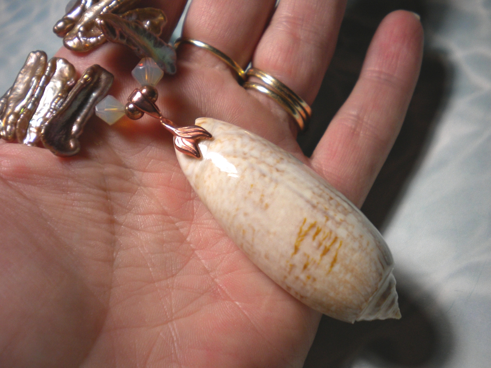 Del's Shells: Olive Shell, Pearl, and Abalone Necklace