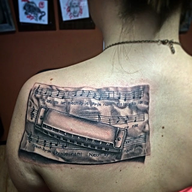 I Have Seen The Whole Of The Internet: Harmonica Tattoo