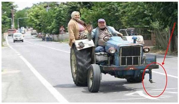 Women are useful around tractors after all..I guess. - TractorByNet