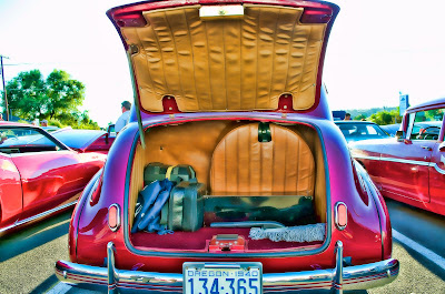 One for the road: the leatherized trunk of a 1940 hot rod. (Click on ...