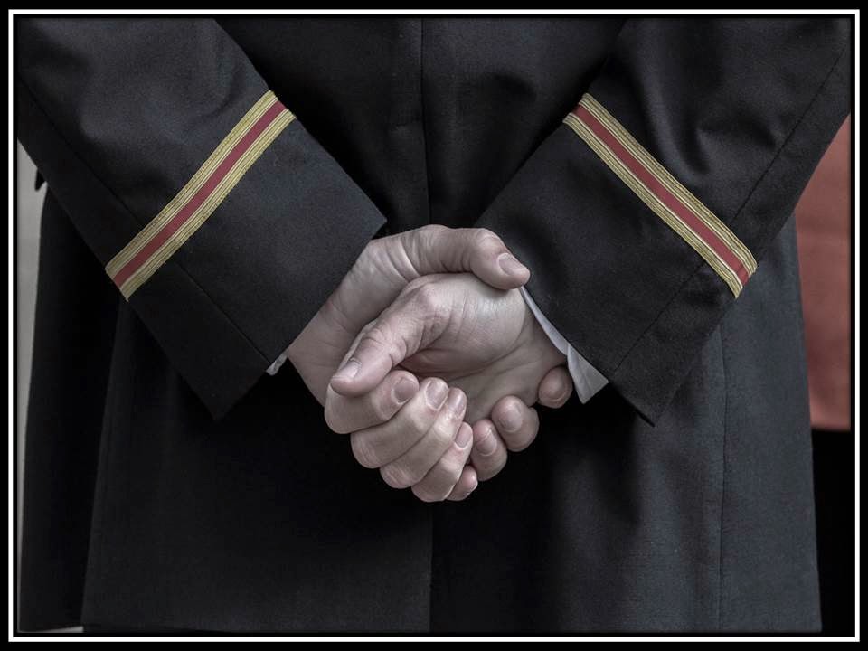 Hands Grabbing Arms Behind Back