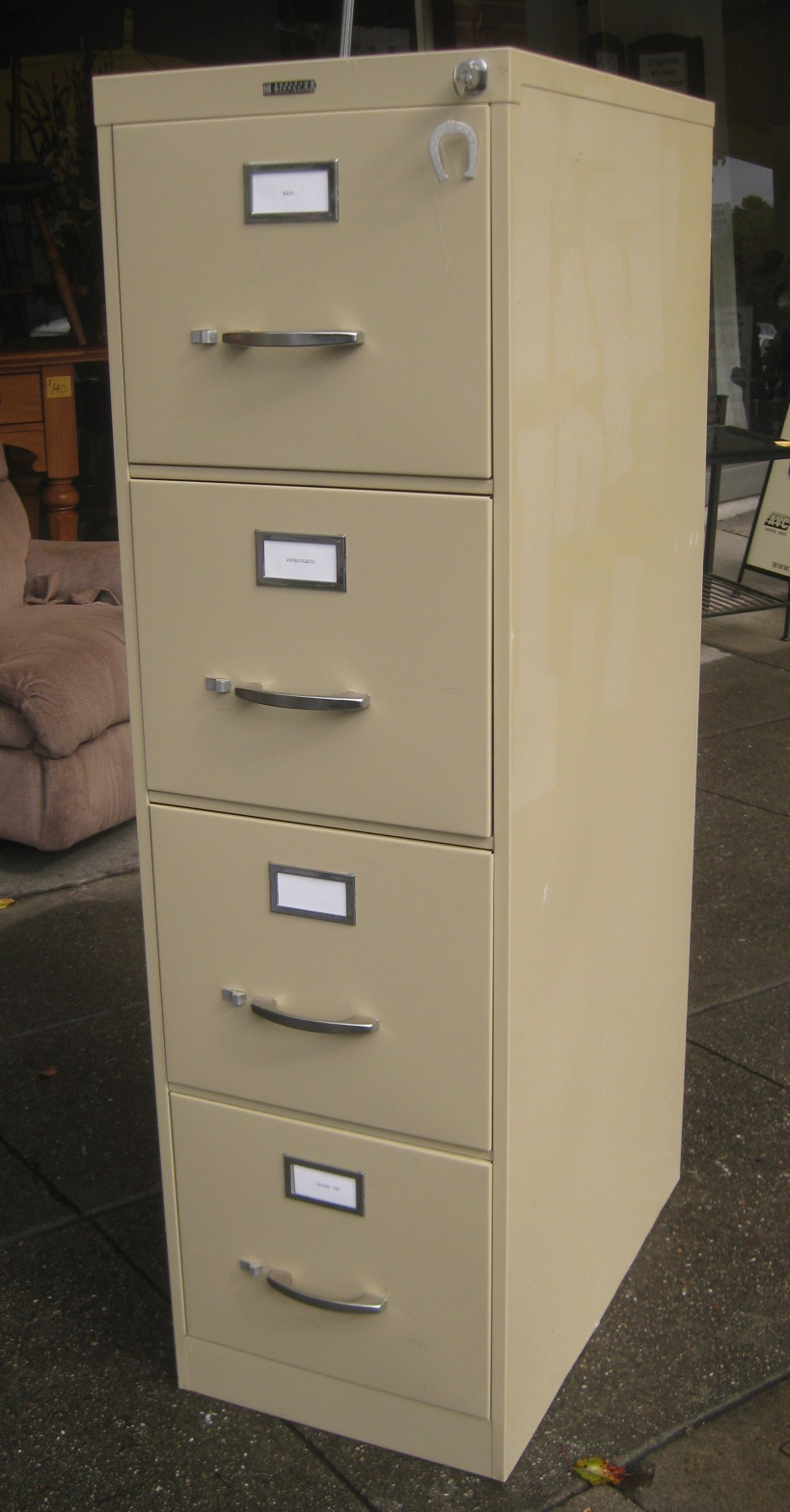 UHURU FURNITURE & COLLECTIBLES: SOLD - Beige File Cabinet (locking!) - $50