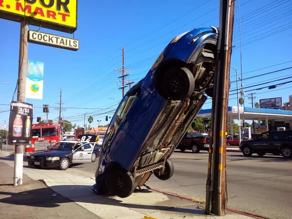 Ramblings by Alexis: Car vs. Pole Photo Captures Absurd Collision In ...