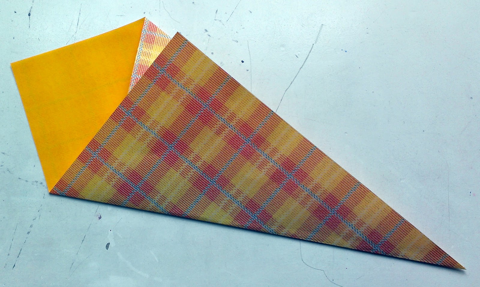 Slightly Surreal: How to Fold an Equilateral Triangle