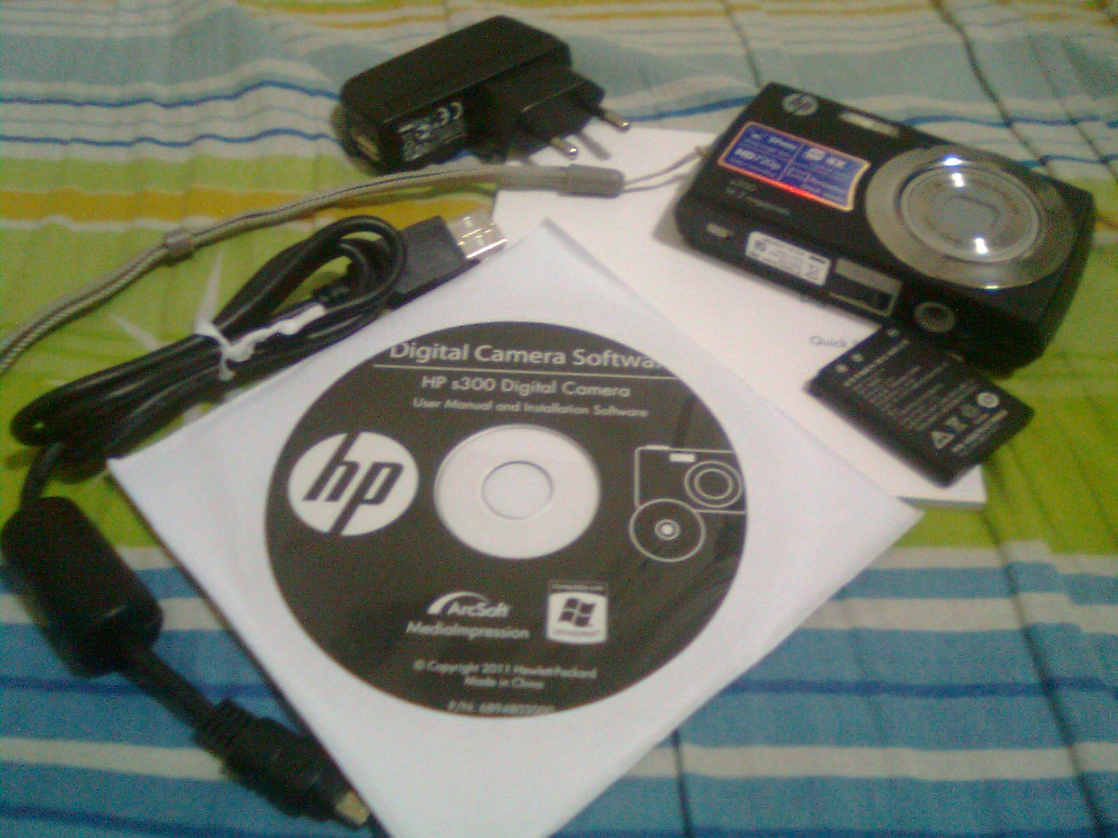 Optional Perspective: Unboxing of HP s300 Digital Camera