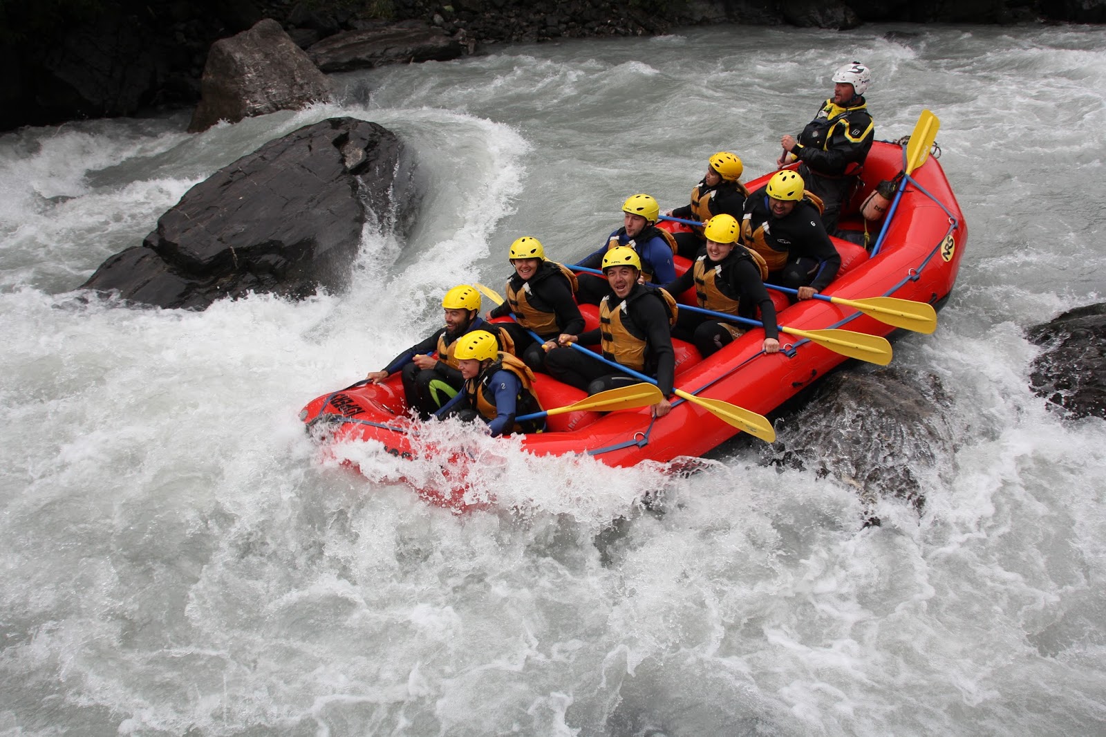 White Water Rafting In The Glacial River Of Interlaken, Switzerland