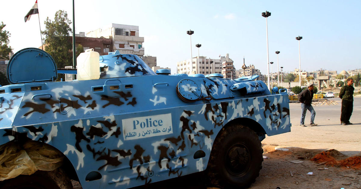 Baby Blue Syrian Army APC uses its turret to lay suppression towards ...