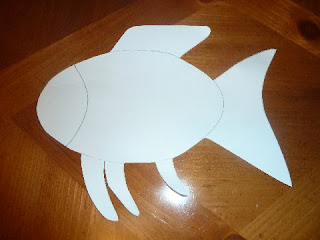 2. I also cut out tissue paper pieces for the tail, face and fins (I ...