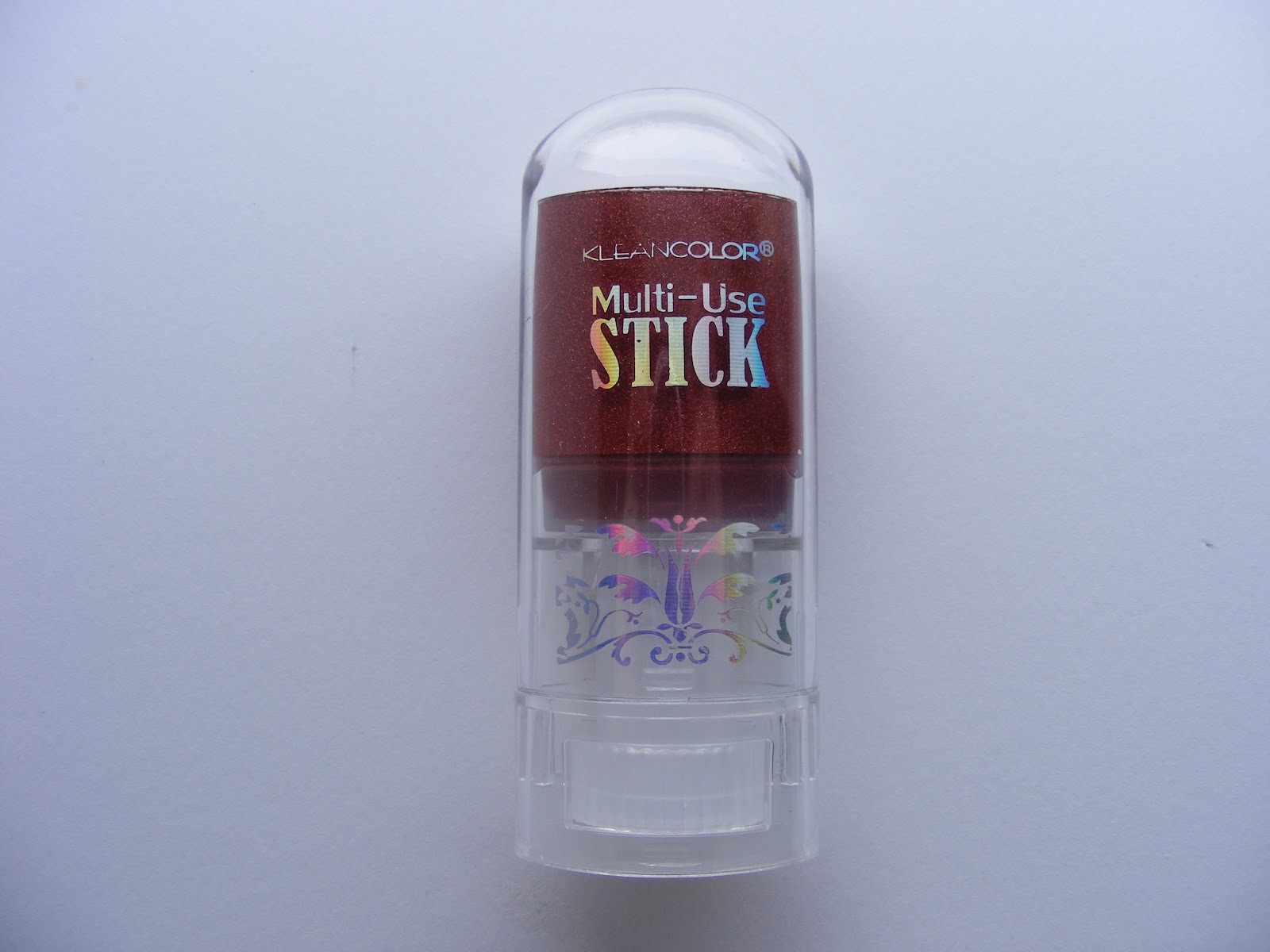 This one is called 'Poppy'. It is a glittery, brick shade in the tube...