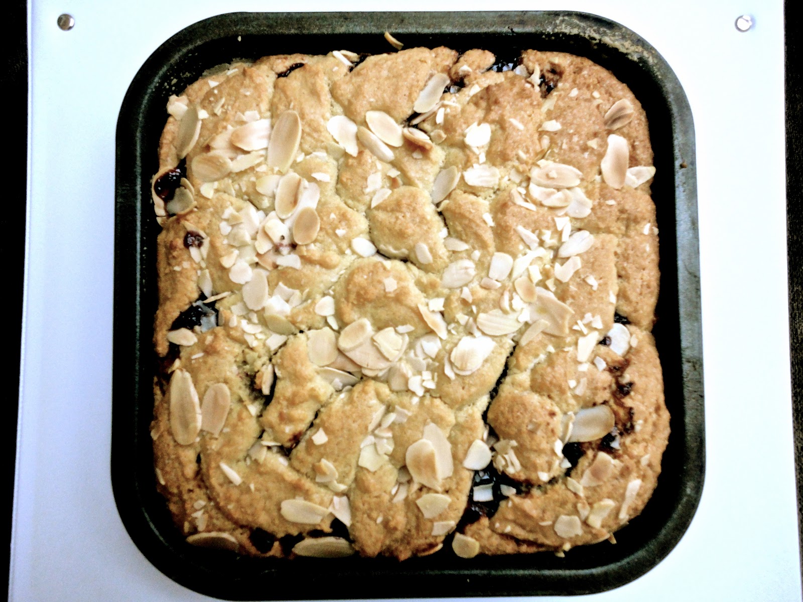 Pippa Cole Cooks: Mum's almond and semolina slice with blackcurrant jam