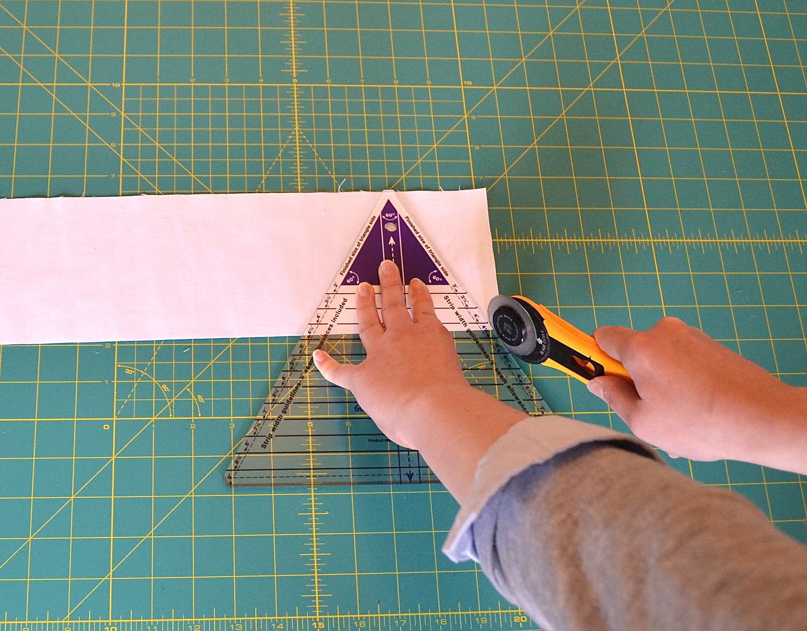 On the Windy Side: How to cut equilateral triangles - a tutorial