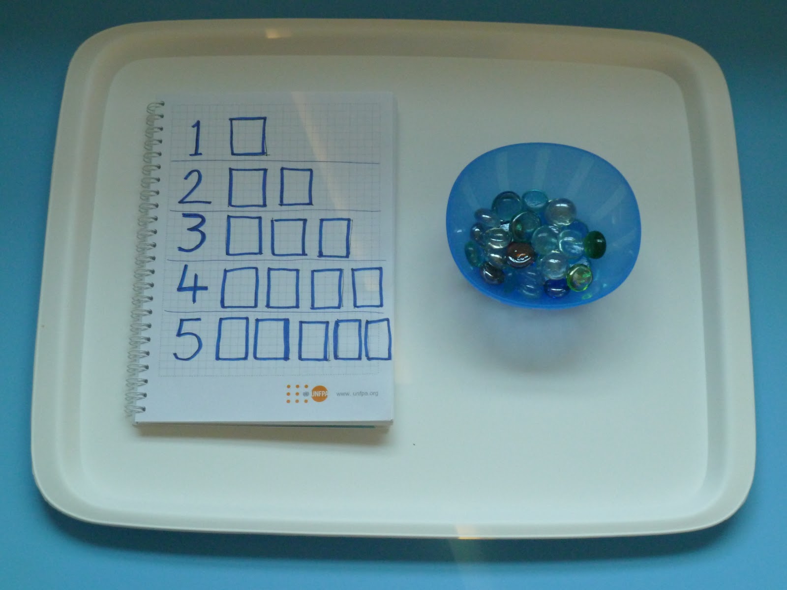 Family FECS: Montessori Activity: Counting with Glass Stones
