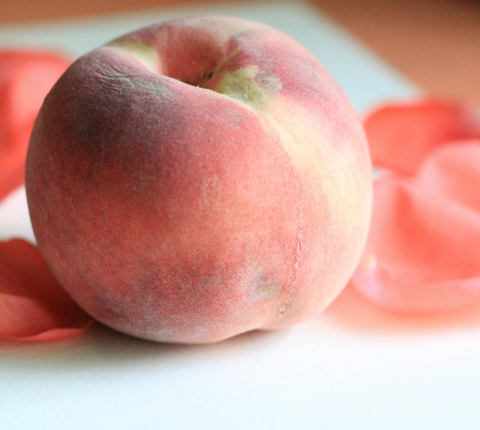 Next, slice them in two and take out the pit.