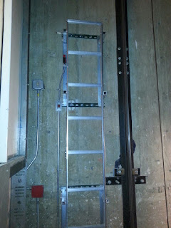 Chicago Elevator Maintenance - Colley Elevator: Retractable ladders ...