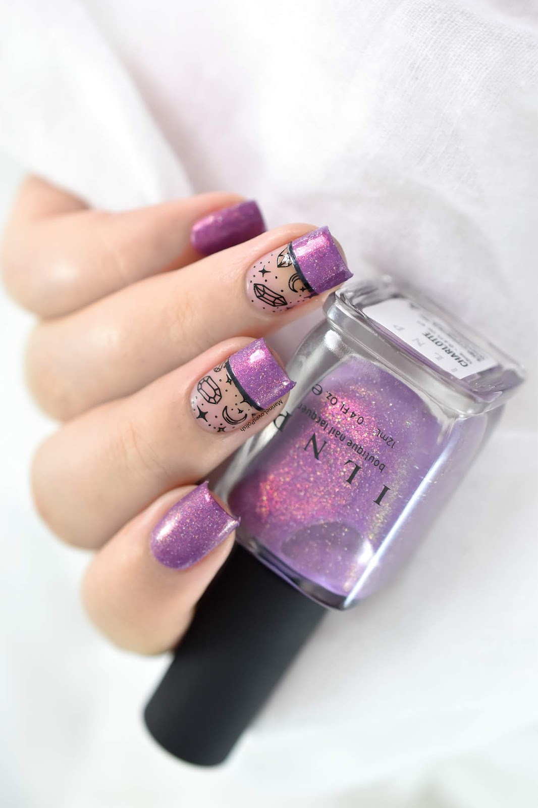 Cosmic Bling Negative Space Nail Art