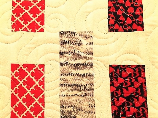 King Jelly Roll Quilt in Red and Black