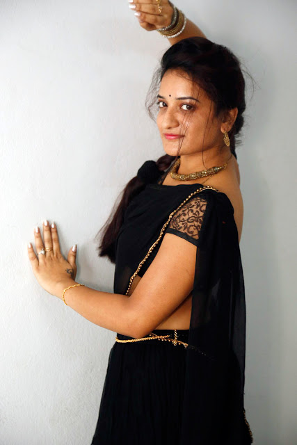 Tamil Latest Actress Janani Reddy in Black Transpaent Saree and Netted ...