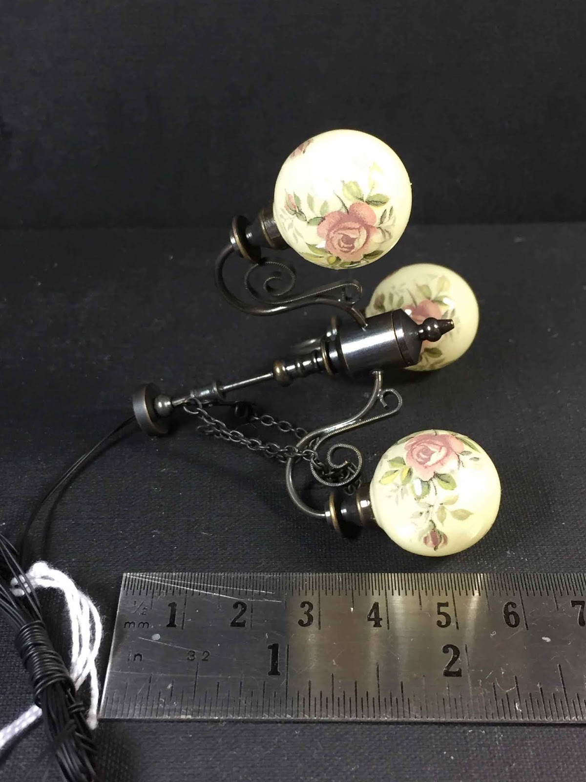 Ray Storey three arm pendant lights