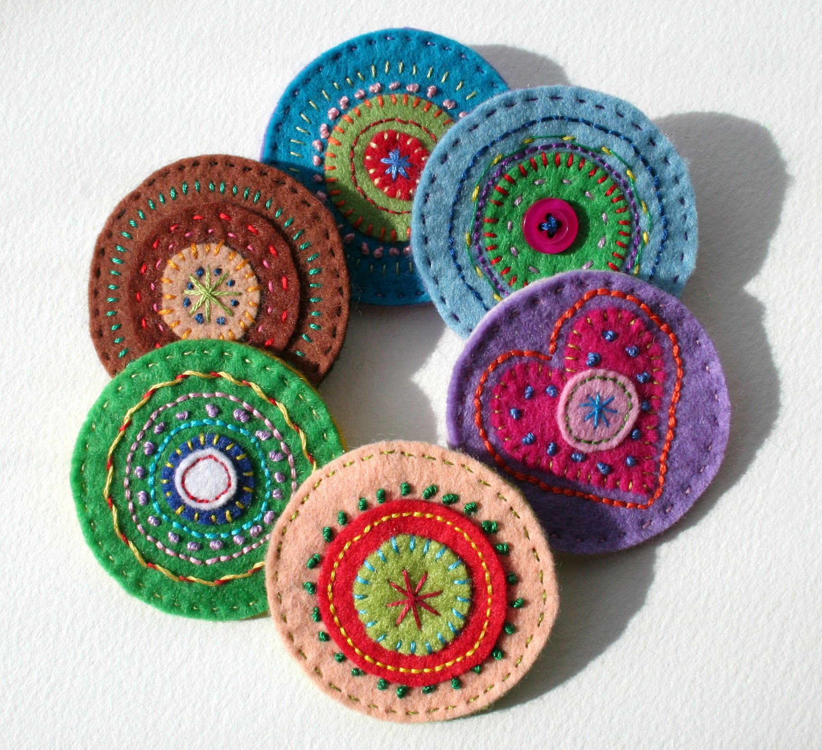 Felt circles transformed into pins.