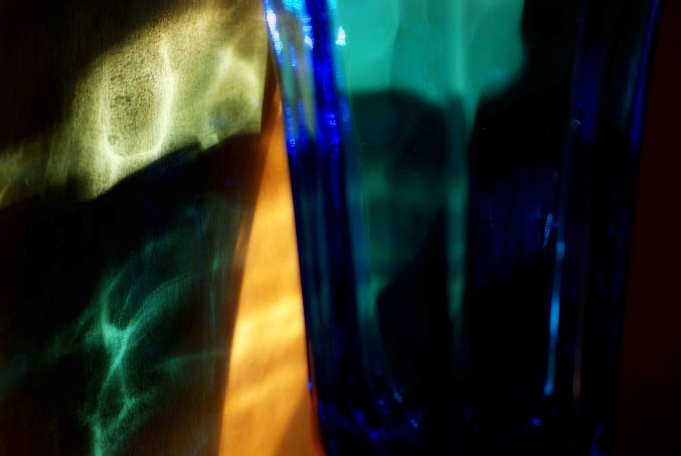 Searching for a Balance: sun through blue glass