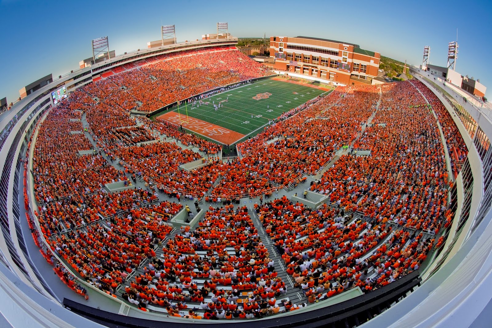 The Cowboy Huddle: Cowboy Football Impacts Oklahoma State