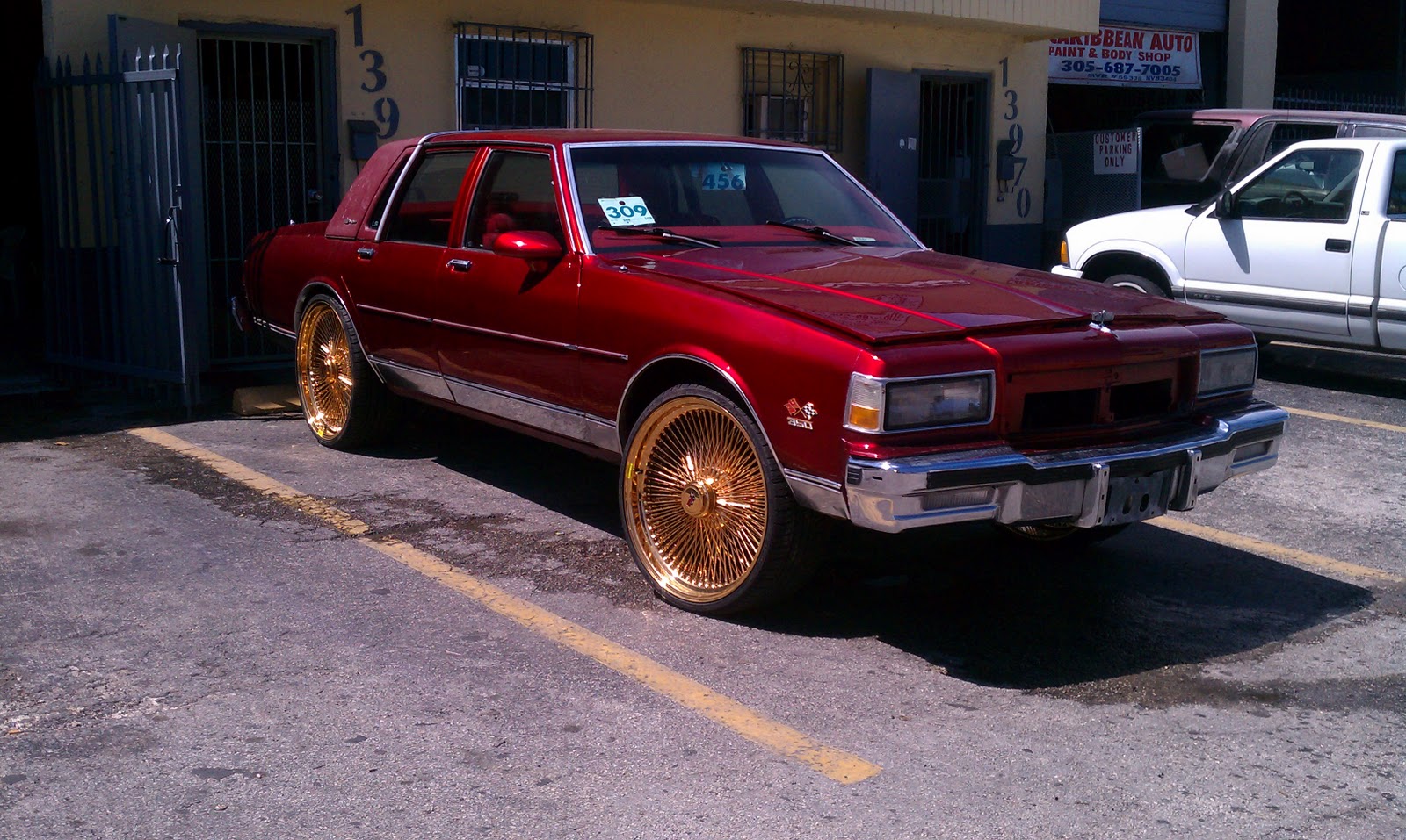 PHOTOGRAPHY BY MIAMIEARL: Box Chevy LS Brougham on 24" Gold Dayton's