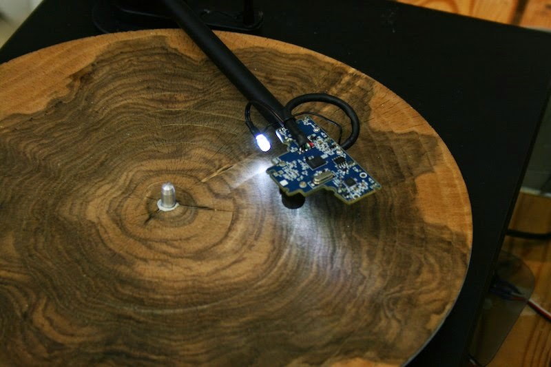 WeirdWood: Slices of Tree Trunk Played on a Record Player
