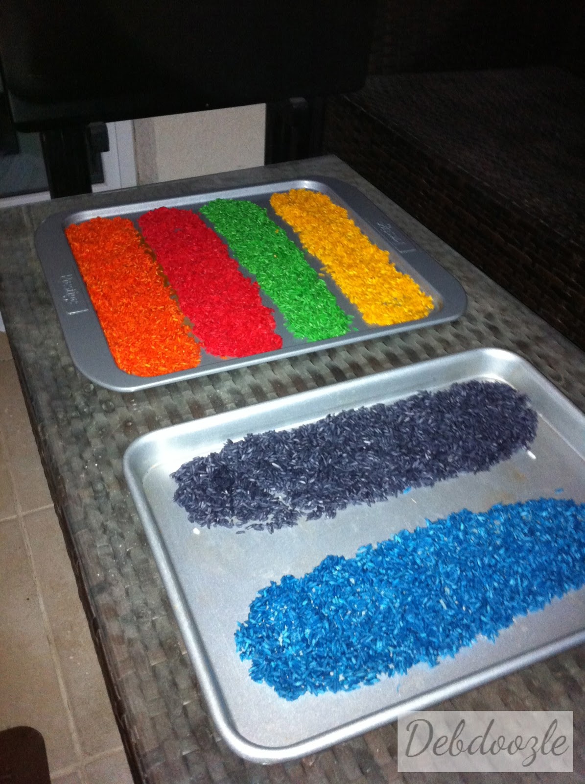 Debdoozle: Colored rice, or tapioca balls.