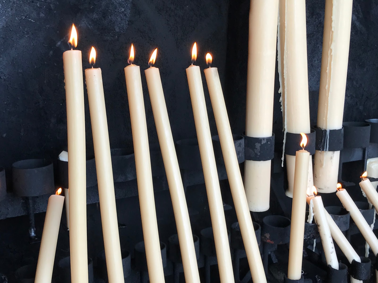 Catholic Pilgrims at Fatima: Lighting a Candle in Fatima