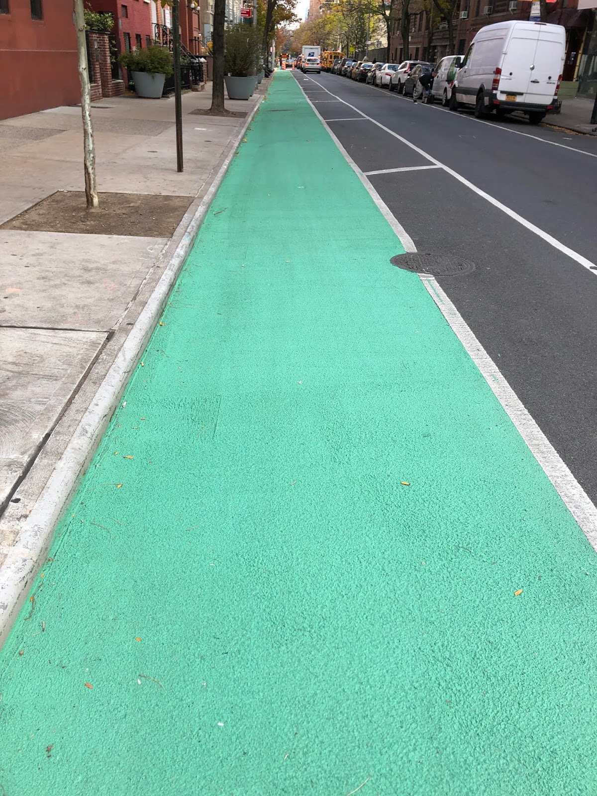 EV Grieve: Green paint arrives on the new 12th Street bike lane