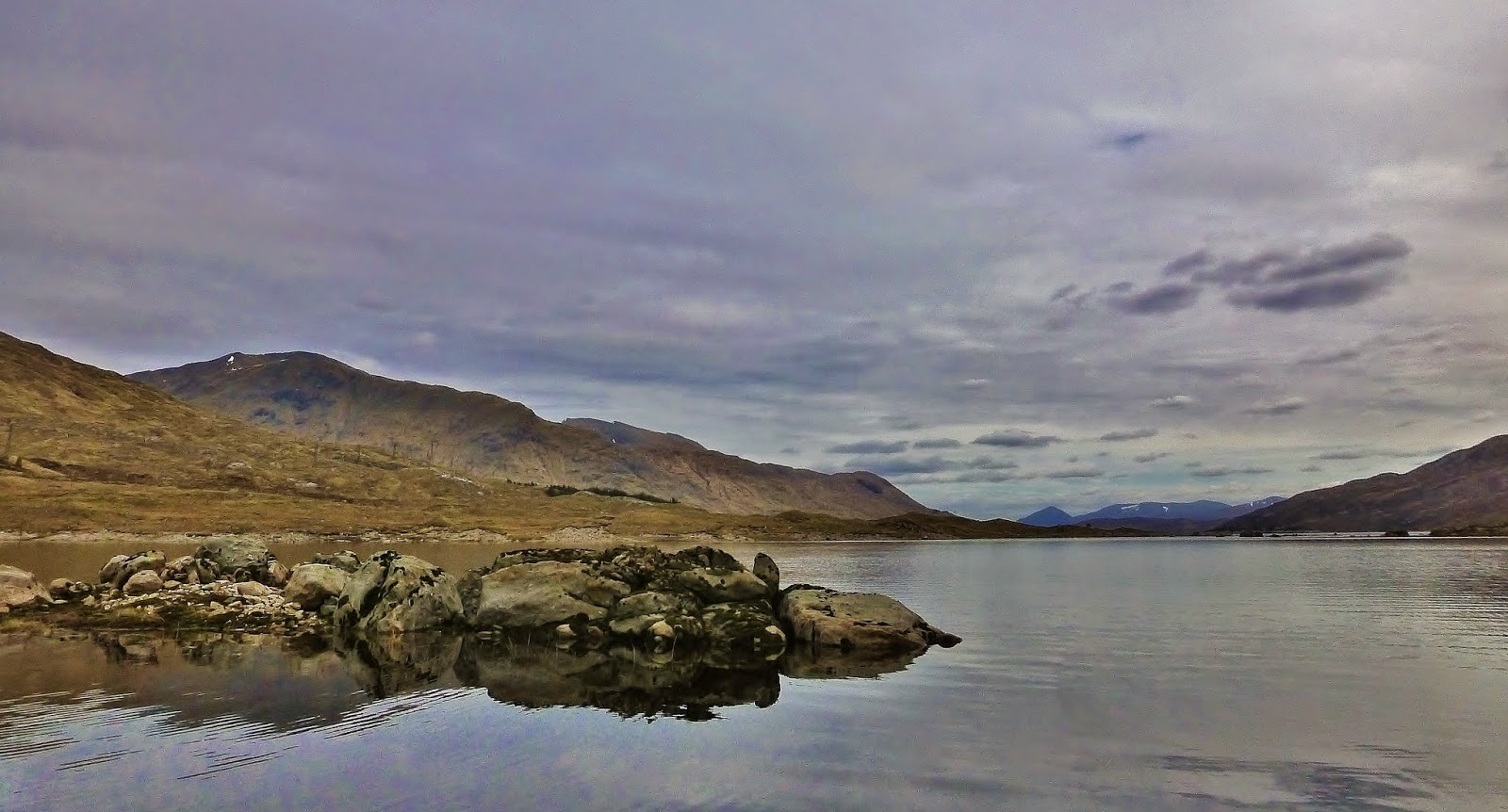 Big Gorse Bush: Canoe on Loch Quoich