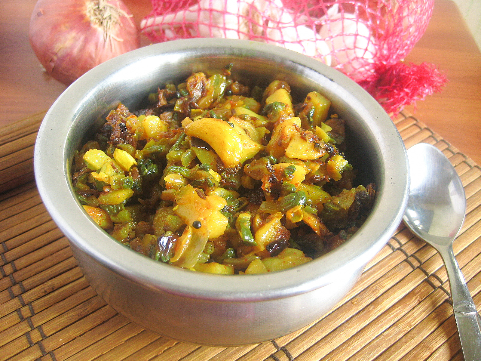 madhuri's kitchen: karela fry recipe / bitter gourd curry / Pavakkai Fry