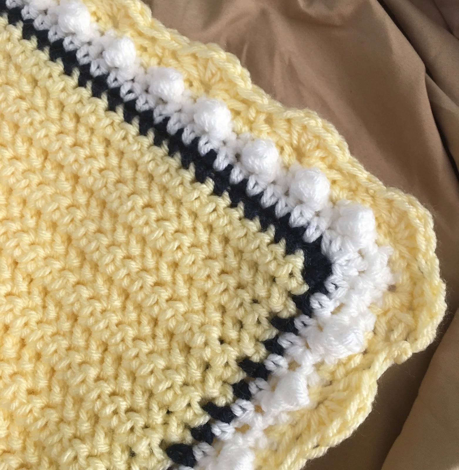 The Perfect Stitch...: Buttercup Michelin Baby Blanket with Bib Logo